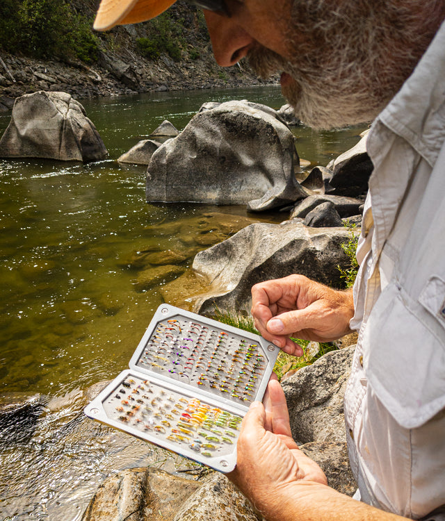 EVA fly boxes - Cross Current Outfitters logo